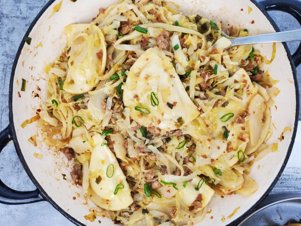 Pierogi Bowl with Cabbage Pears and Sausage - Women of Today