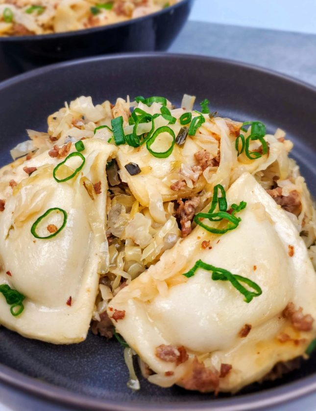 Pierogi Bowl with Cabbage Pears and Sausage - Women of Today