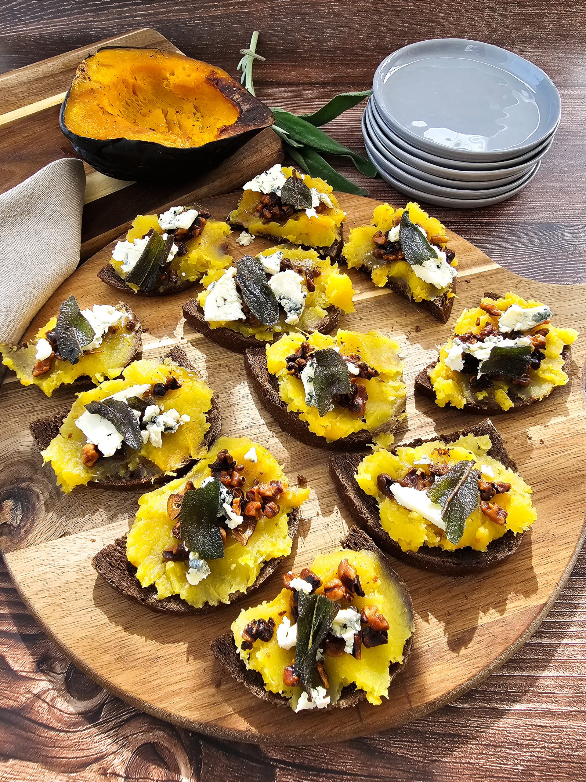 Smashed Acorn Squash with Pumpernickel Crostini - Women of Today