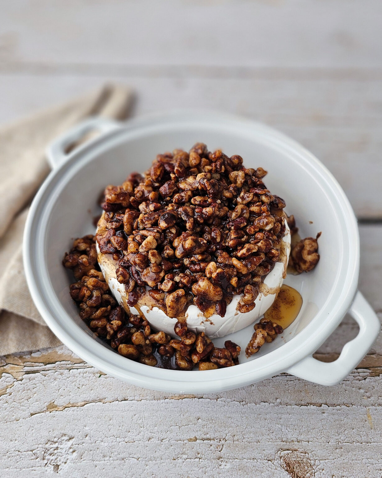 Baked Brie with Toasted Nuts, Cinnamon, and Maple Syrup - Women of Today